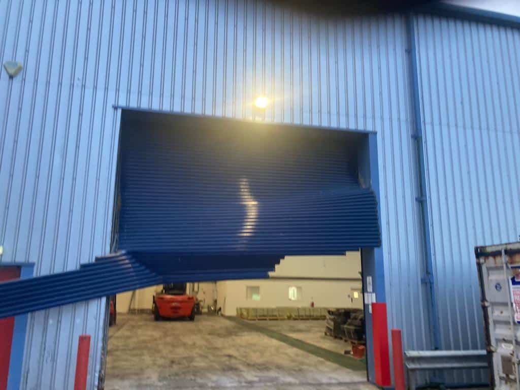 Repair for Vehicle-Damaged Roller Shutter Door - Premier Industrial Doors